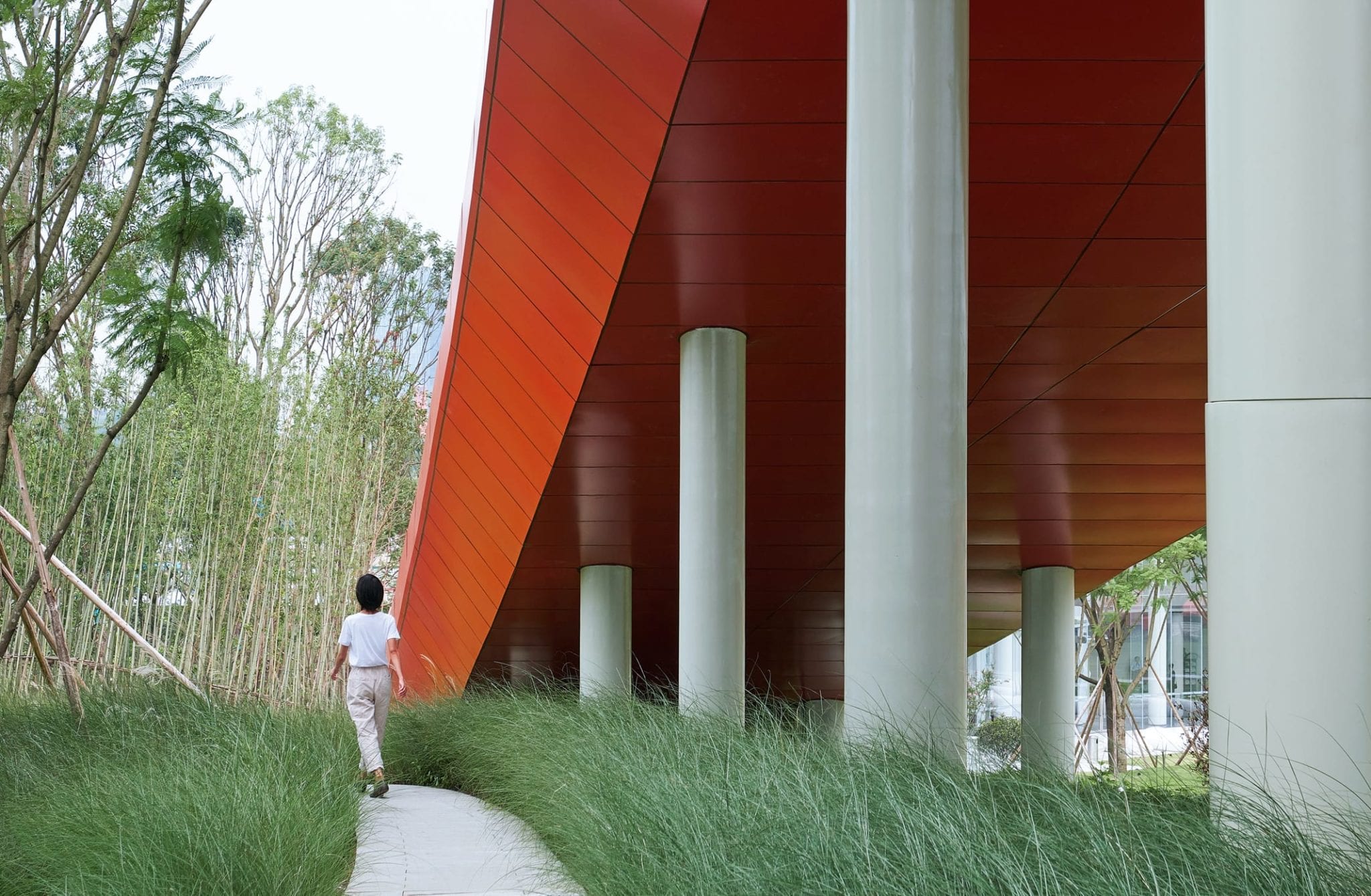 Powerhouse Company designs undulating red walkway for new Chengdu ...